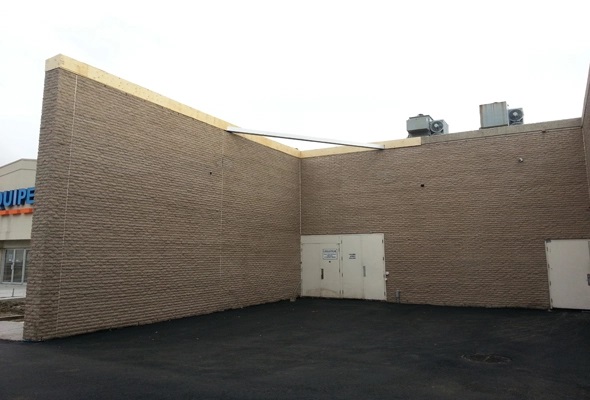 Installation of steel structure in the brick wall - Restaure-action